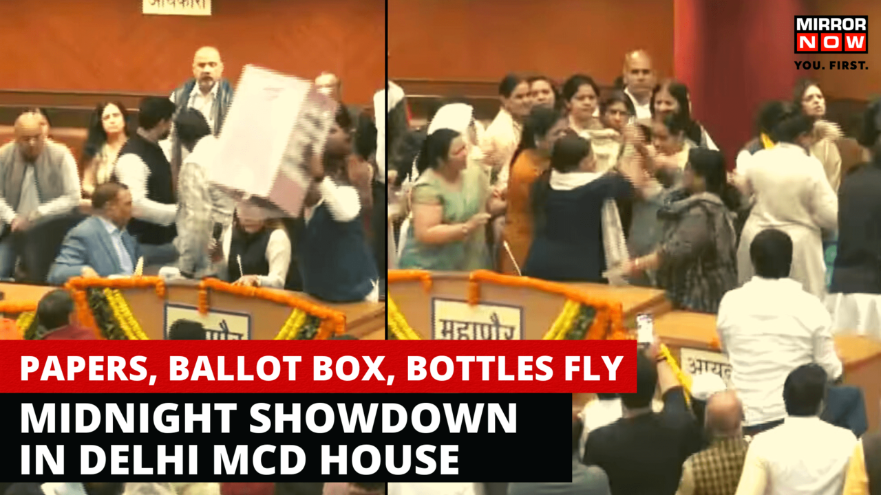 AAP, BJP Councillors clash inside MCD House, throws papers, bottles ...