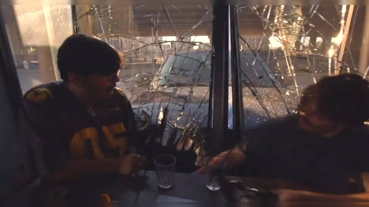 Lucky escape: Car crashes into cafe during podcast, window behind host ...