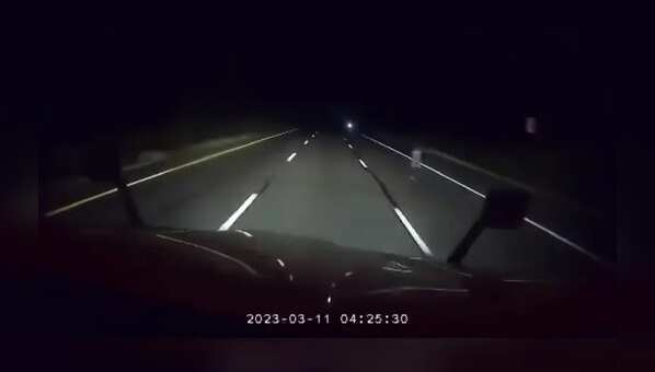 Truck driver records strange moving figure on highway, netizens ...