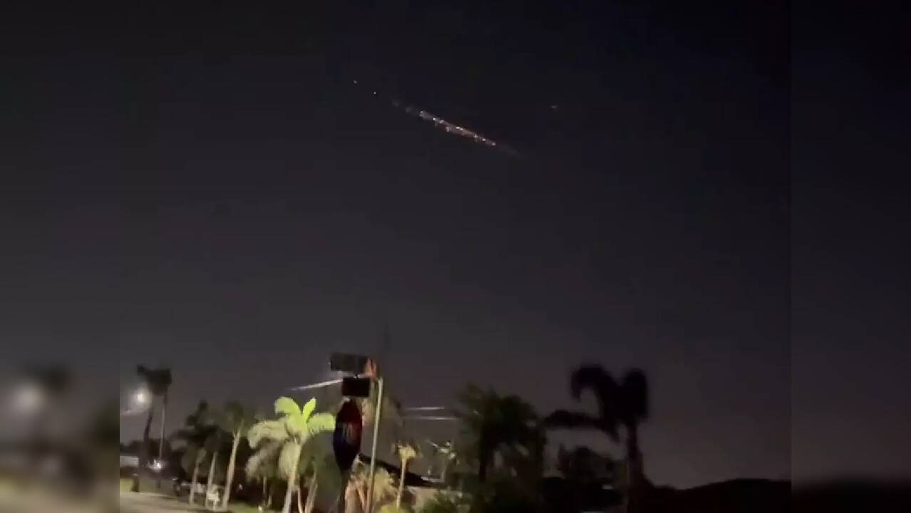 On Camera: People baffled after spotting mysterious orange-hued objects ...