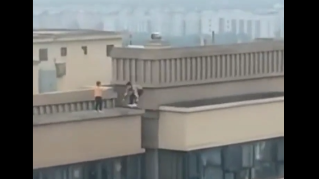 Boy Dangerously Jumps Over Gap Between 27-Storey Buildings In Shocking ...